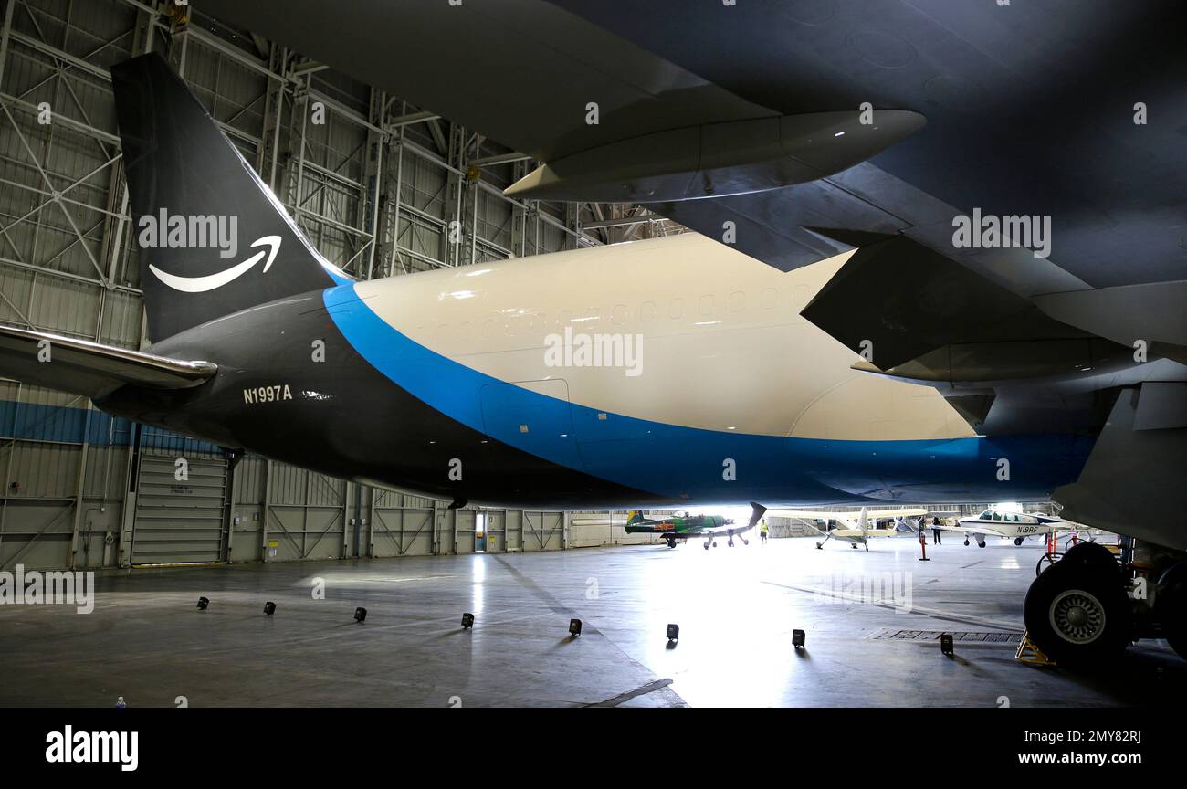 The Amazon.com "smile" logo is shown on the tail of a Boeing 767 "Prime ...