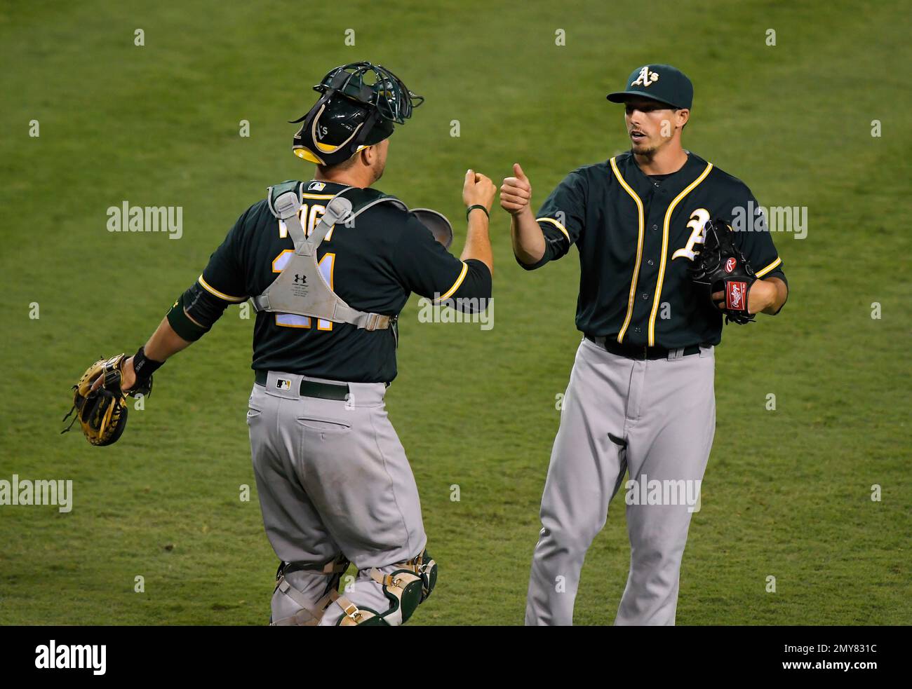 Oakland Athletics catcher Stephen Vogt, left, and relief pitcher Ryan ...