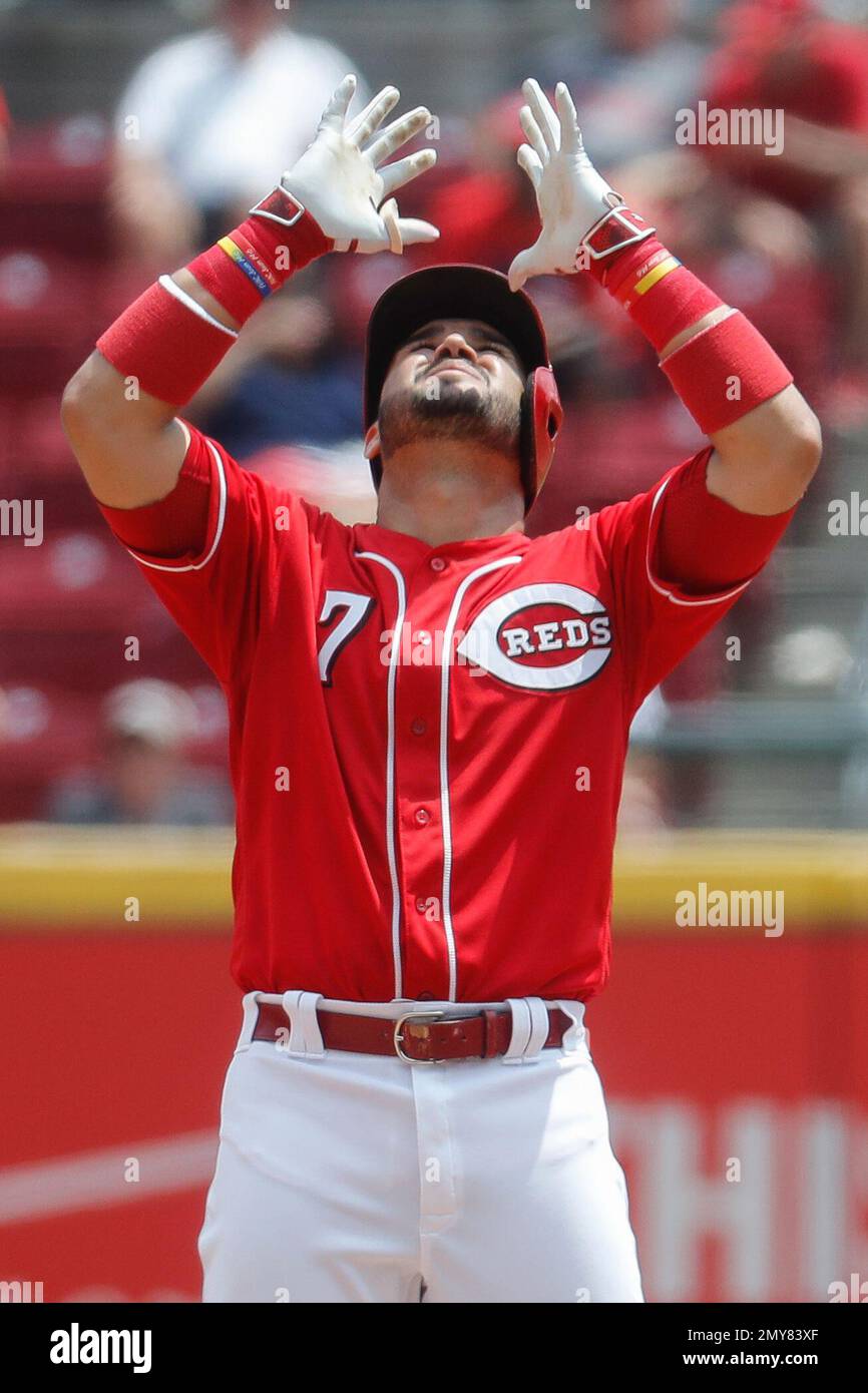 Cincinnati Reds' Eugenio Suarez reacts after hitting an RBI double off ...