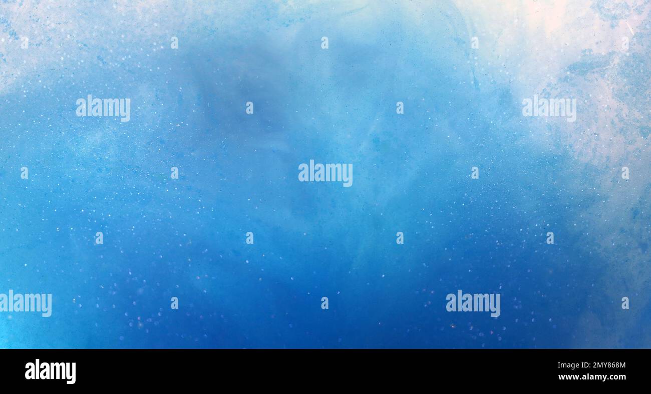 Blue glitter paper background hi-res stock photography and images - Alamy