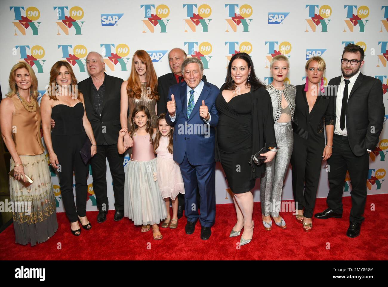 Singer Tony Bennett, center, poses with family members at his 90th ...