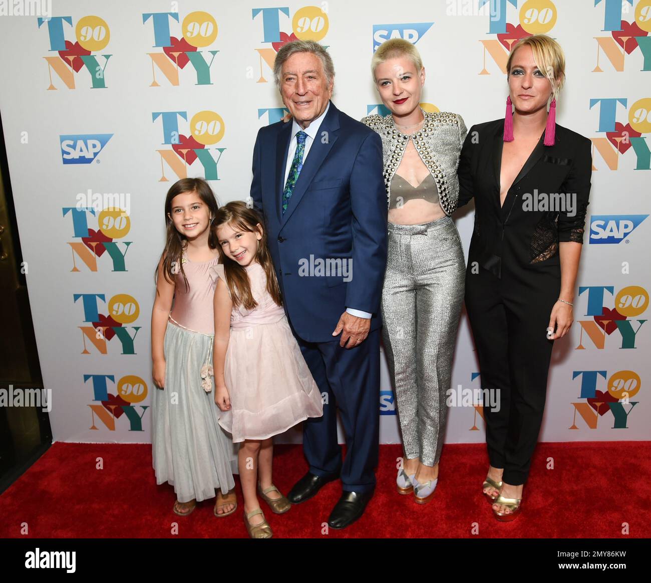 Singer Tony Bennett, center, poses with family members at his 90th ...