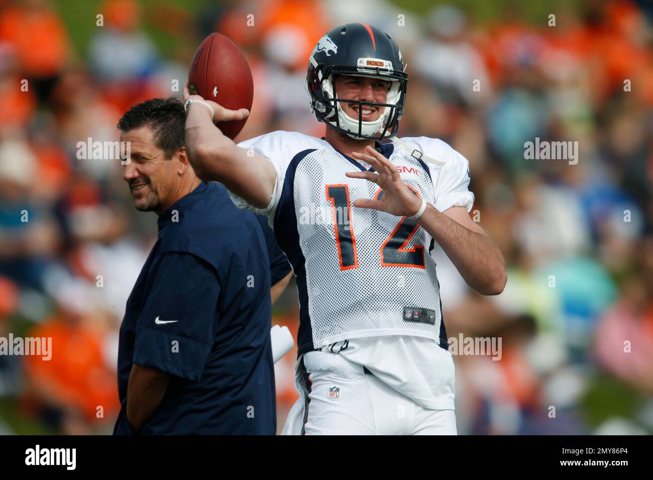 Denver Broncos quarterback Paxton Lynch takes part in drills as quarterbacks coach Greg Knapp ...