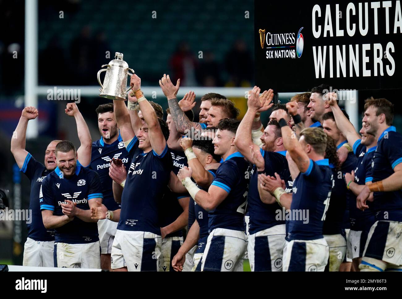 Scotland captain James Ritchie lifts the Calcutta Cup trophy with team ...