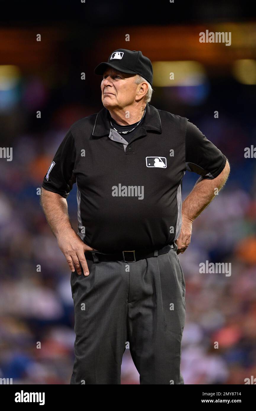 Umpire Bob Davidson looks on during a baseball game between the ...