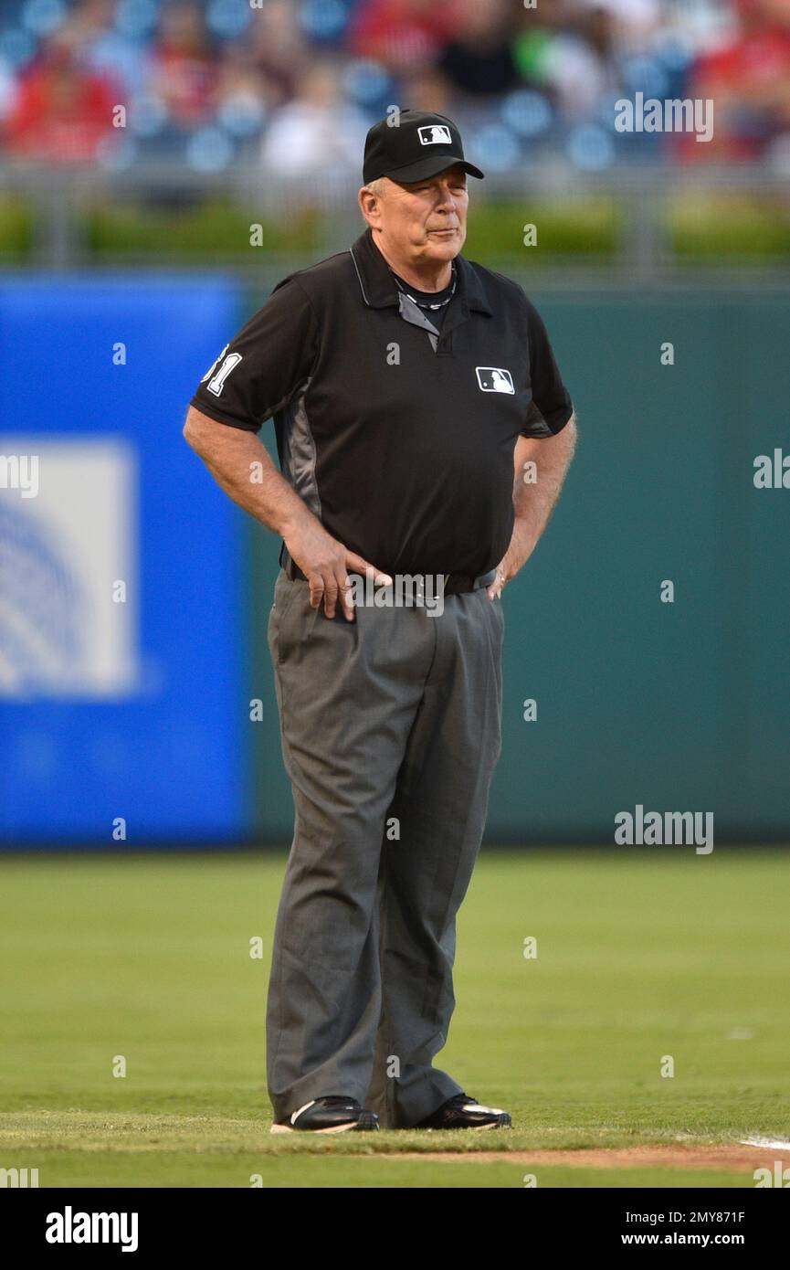Umpire Bob Davidson looks on during a baseball game between the ...