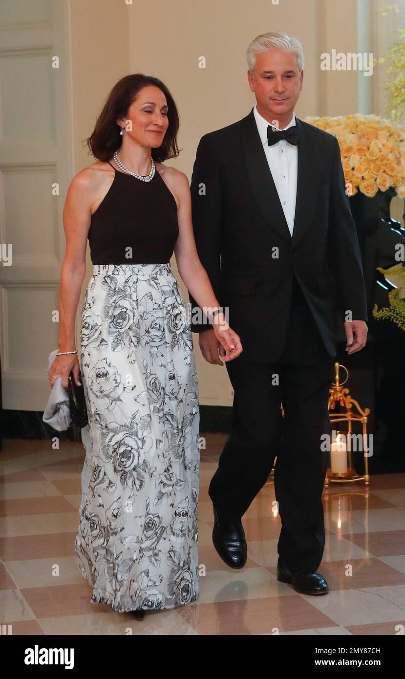 Charles Scharf, right, Chief Executive Officer, Visa Inc., and Amy ...