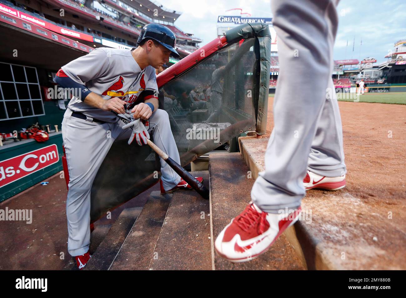 St. Louis Cardinals' Stephen Piscotty, left, walks to take the on-deck ...