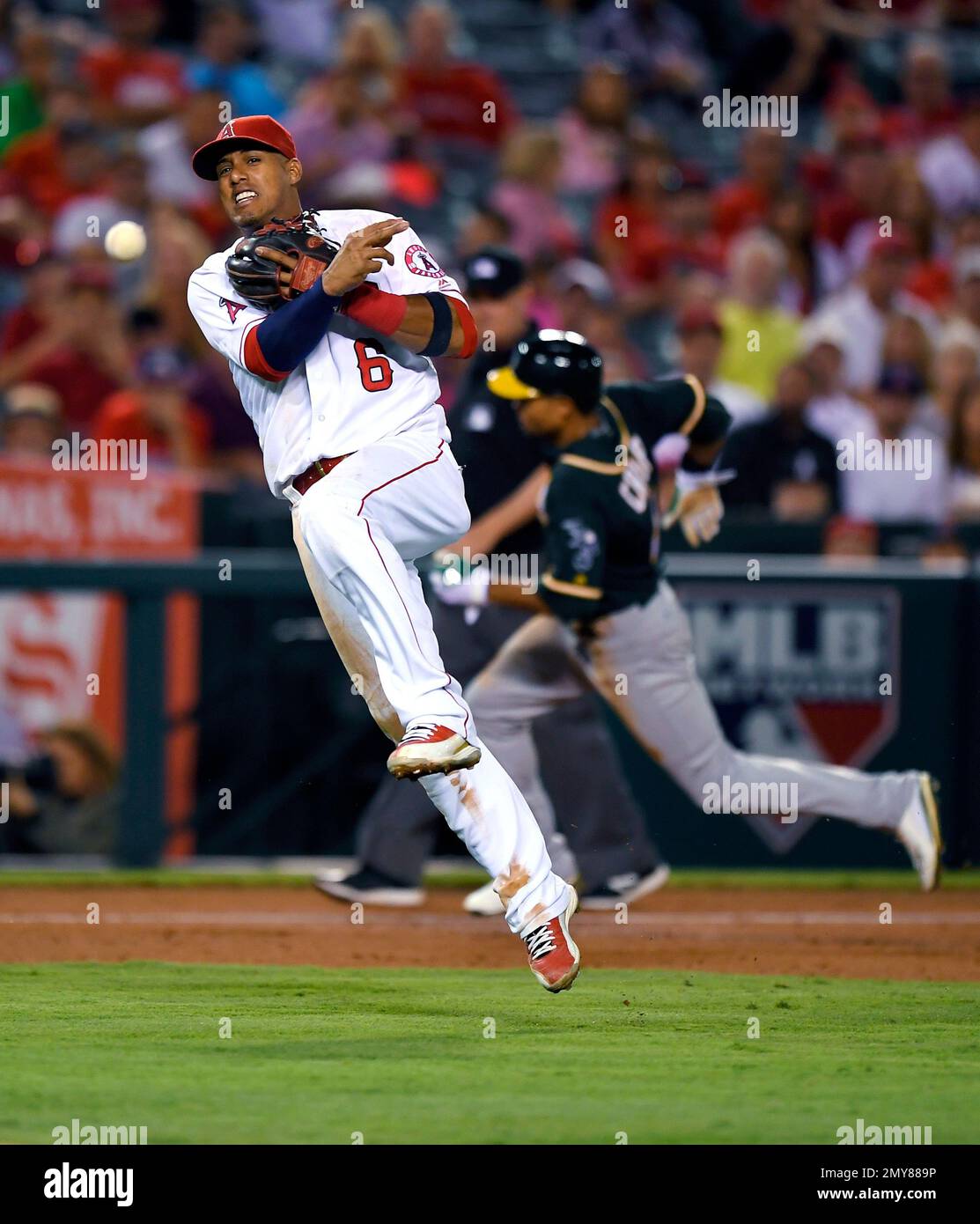 Los Angeles Angels third baseman Yunel Escobar throws out Oakland ...