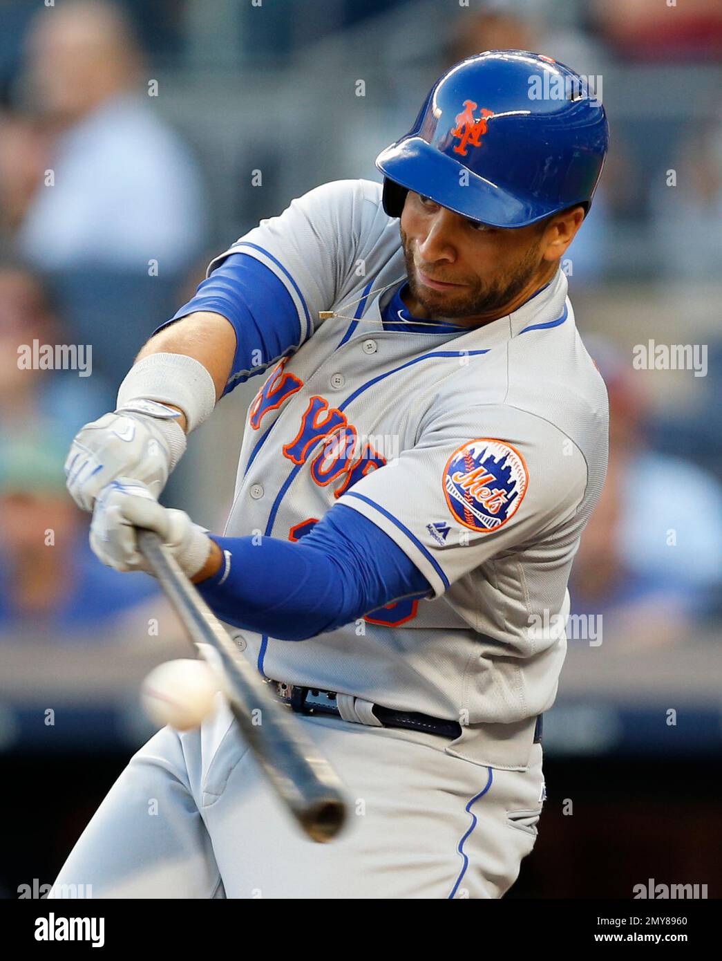 New York Mets' James Loney his an RBI single during the first inning of ...