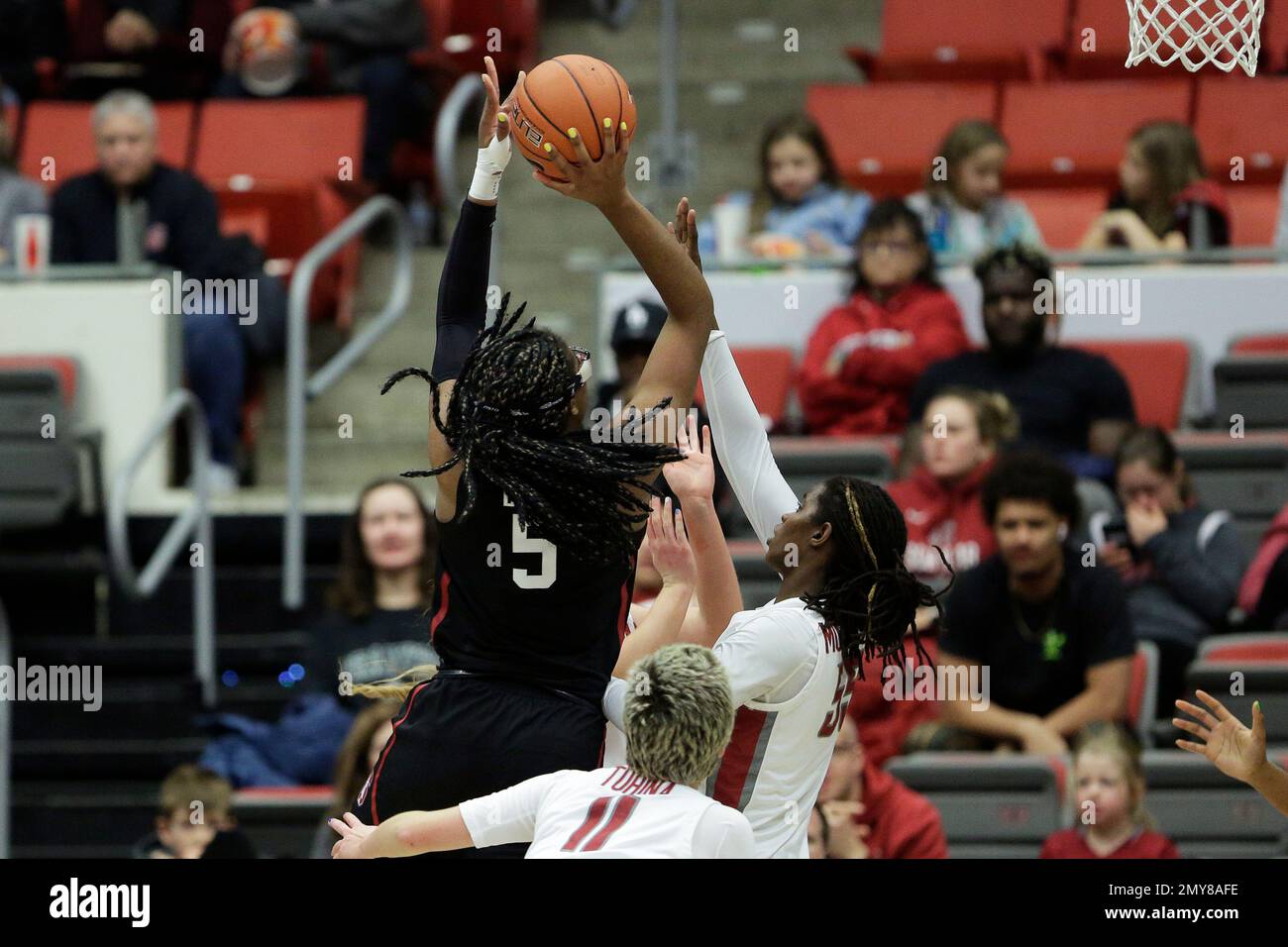 Stanford forward Francesca Belibi (5) shoots while defended by ...