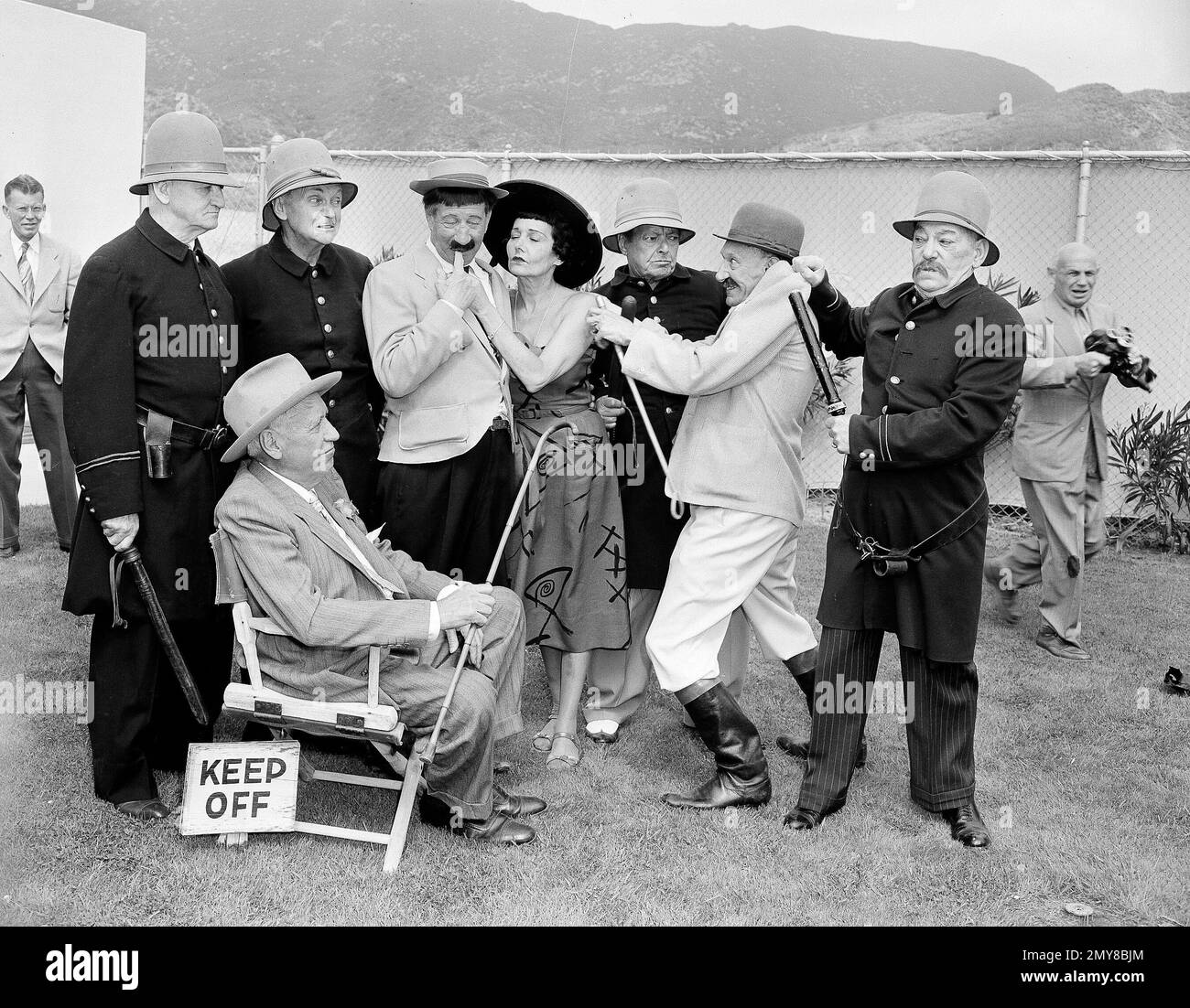 Mack Sennett, seated, relives the old days at his 70th birthday party ...