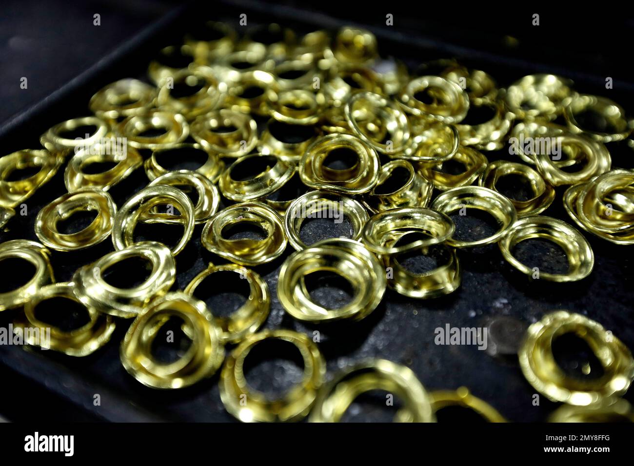 This Wednesday, July 6, 2016 photo shows a tray of grommets for use in ...