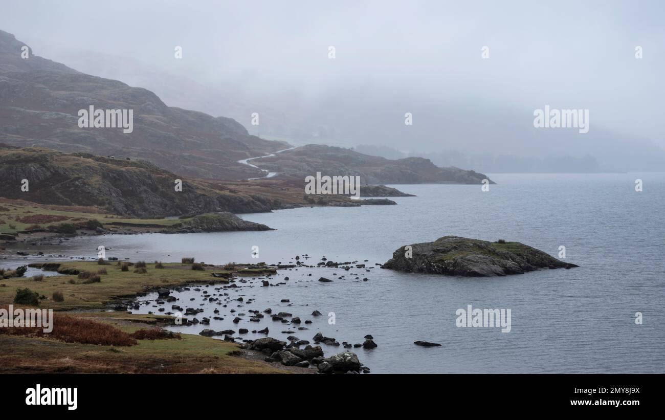 Beautiful dramatic Winter foggy landscape image of Wast Water in ...