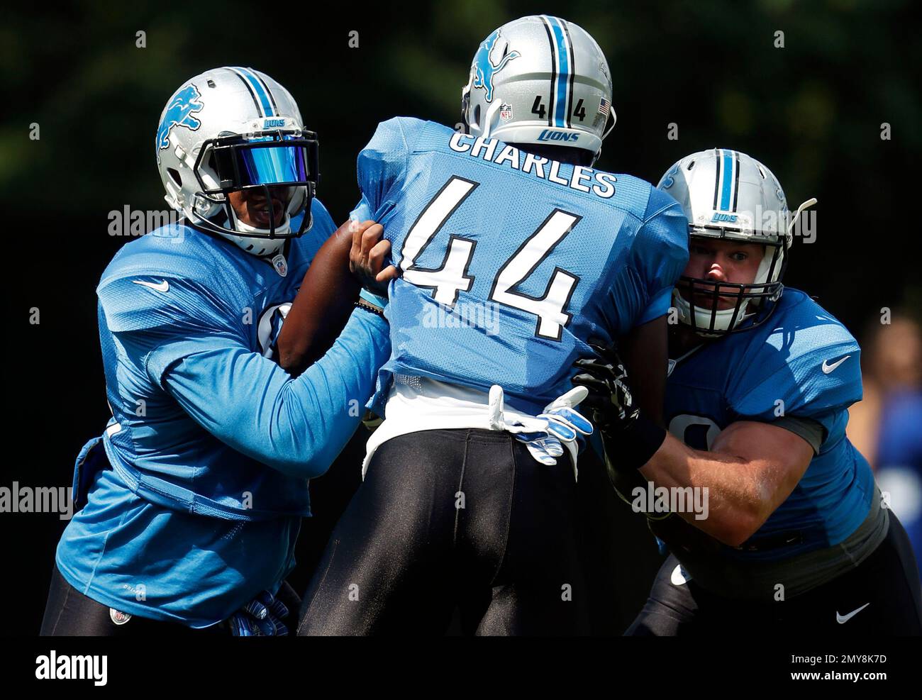 Detroit Lions tight ends Eric Ebron, left, and Matthew Mulligan block ...