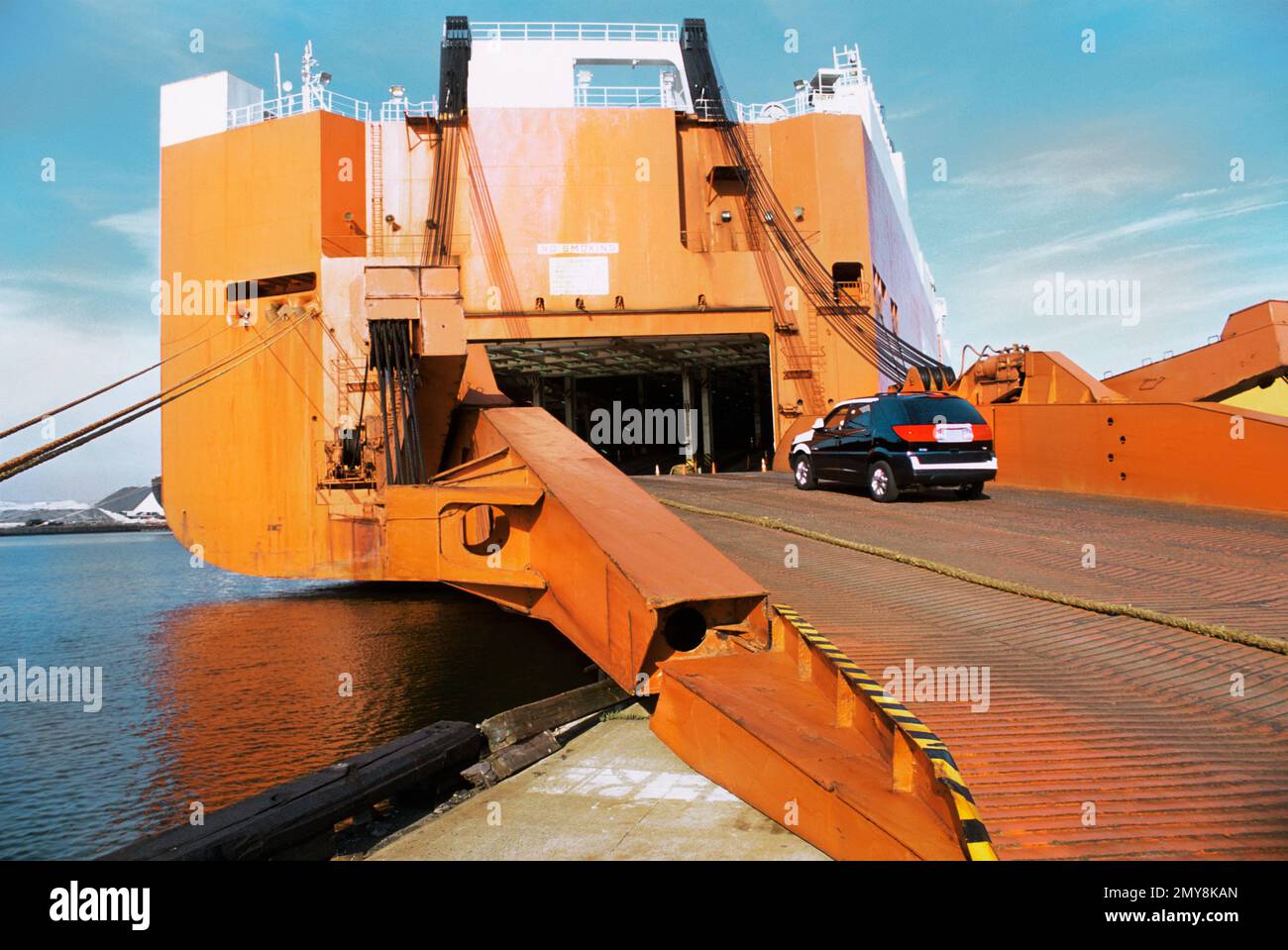 Car driving up ramp of transport ship hi-res stock photography and ...
