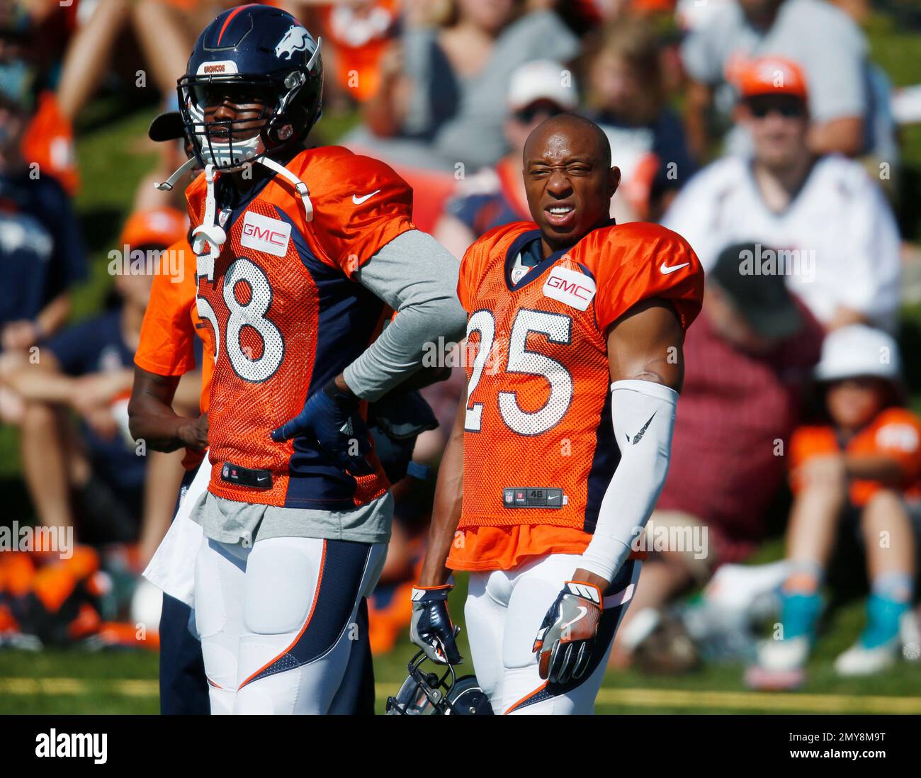 Denver Broncos outside linebacker Von Miller, left, and cornerback ...
