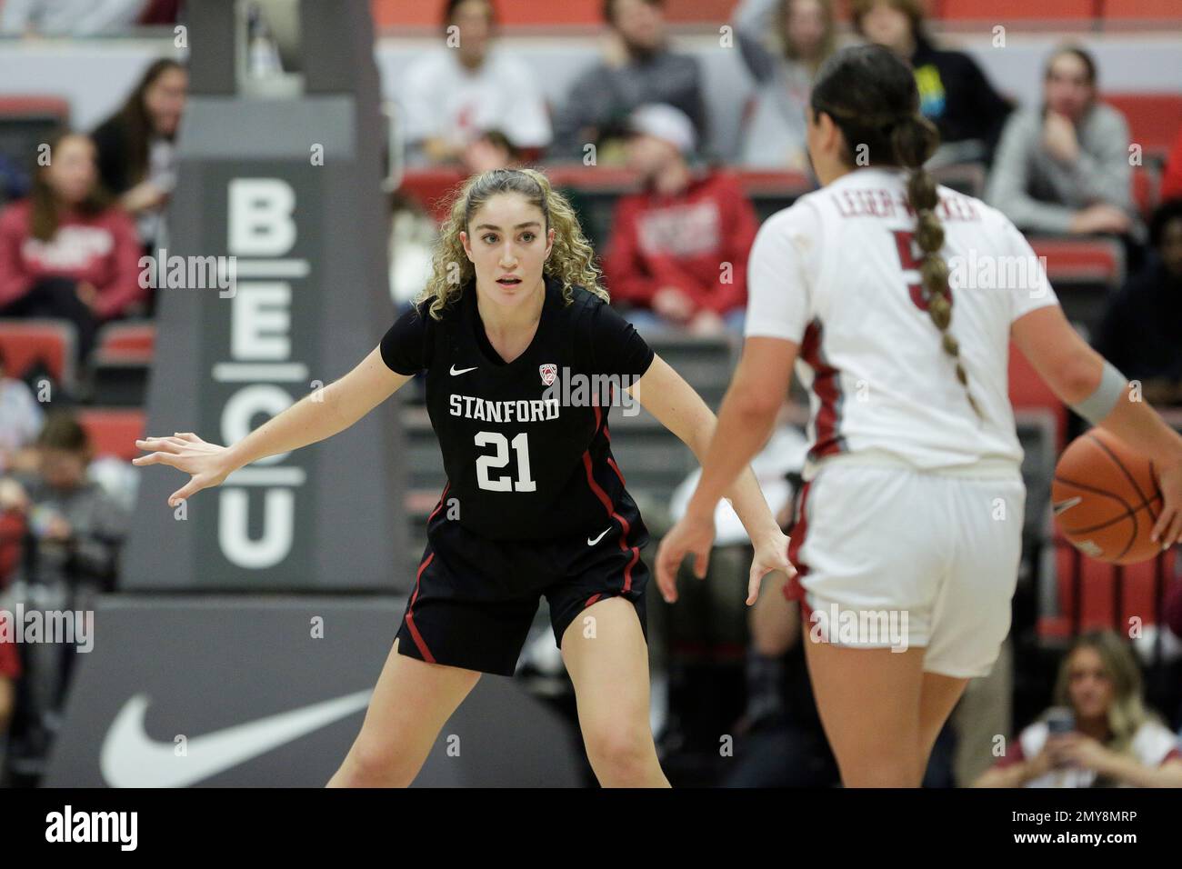 Stanford forward Brooke Demetre (21) defends Washington State guard Charlisse Leger-Walker (5 ...