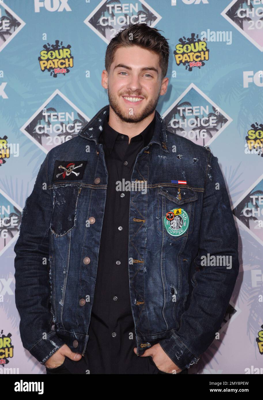 Cody Christian poses in the press room at the Teen Choice Awards at the ...