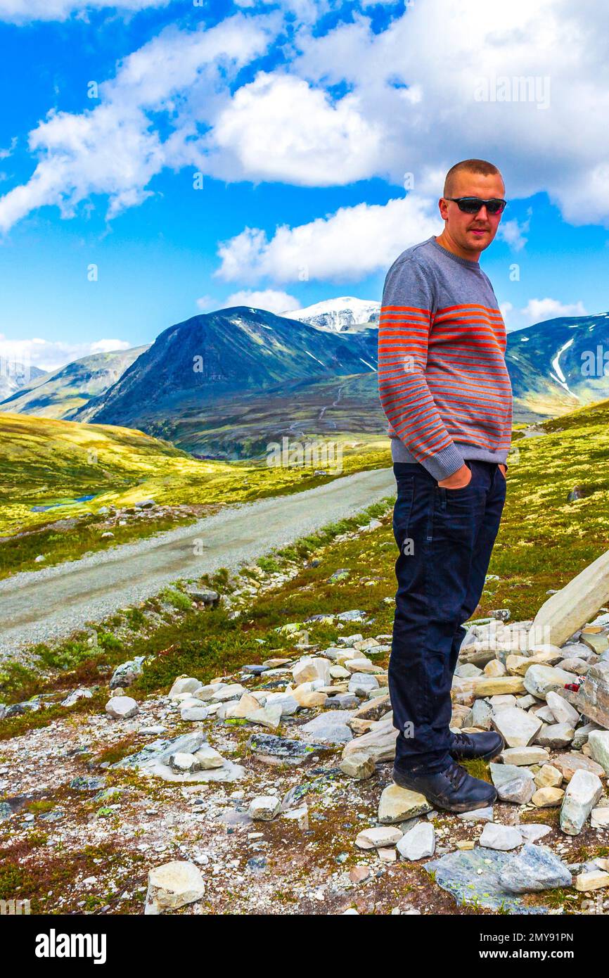 Young hiker and beautiful summer landscape panorama with mountains ...