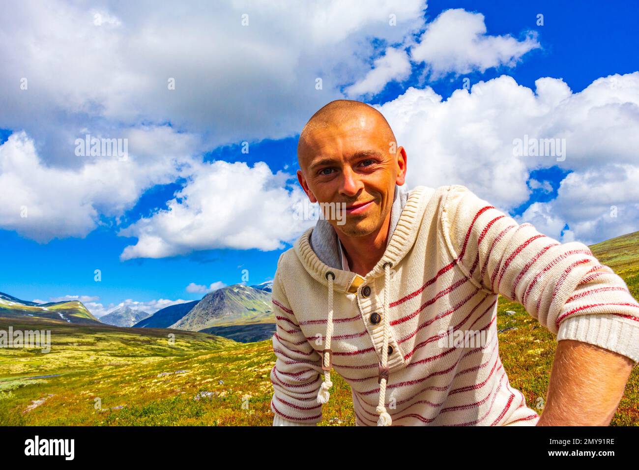 Young hiker and beautiful summer landscape panorama with mountains ...