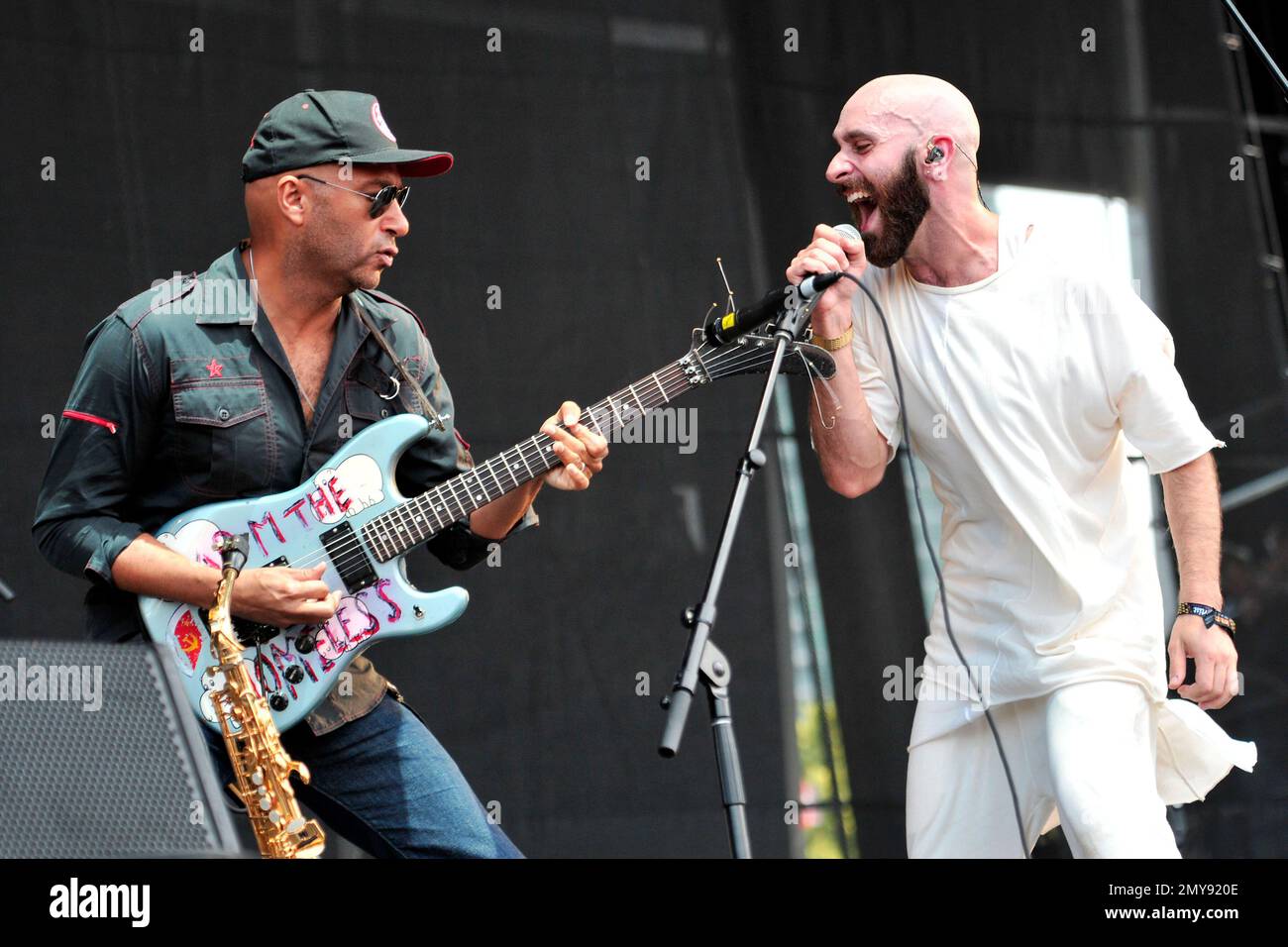 Tom Morello, left, joins Sam Harris and X Ambassadors and performs on ...