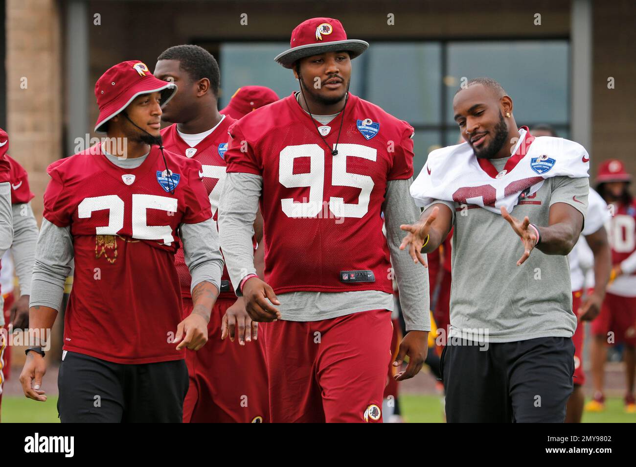 Washington Redskins defensive end Corey Crawford (95) and wide receiver ...