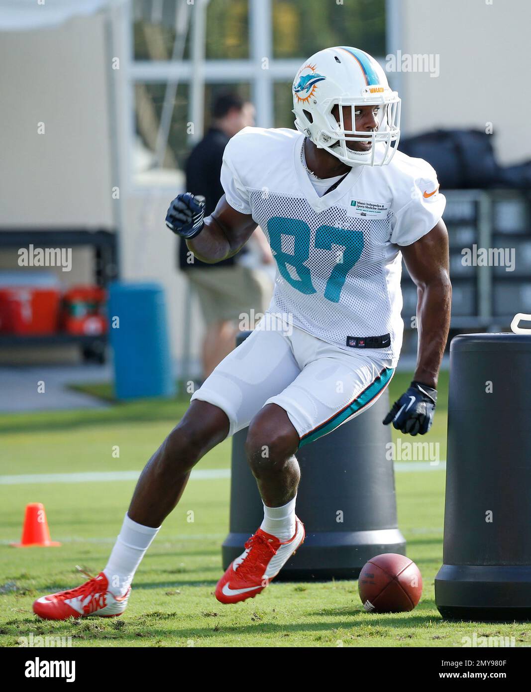 Miami Dolphins' Rashawn Scott (87) runs a drill during the NFL football ...