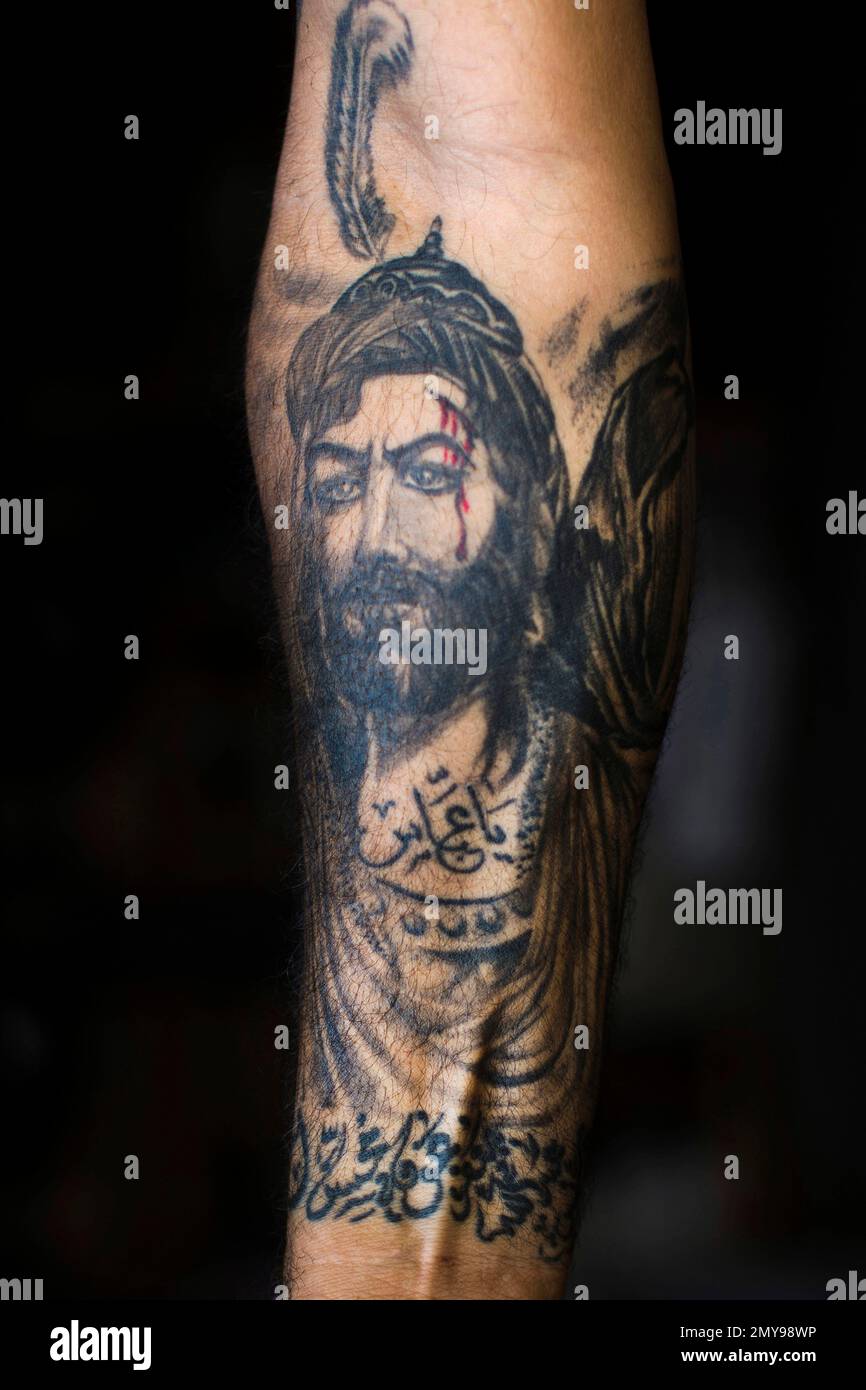 Nas Logo Tattoo