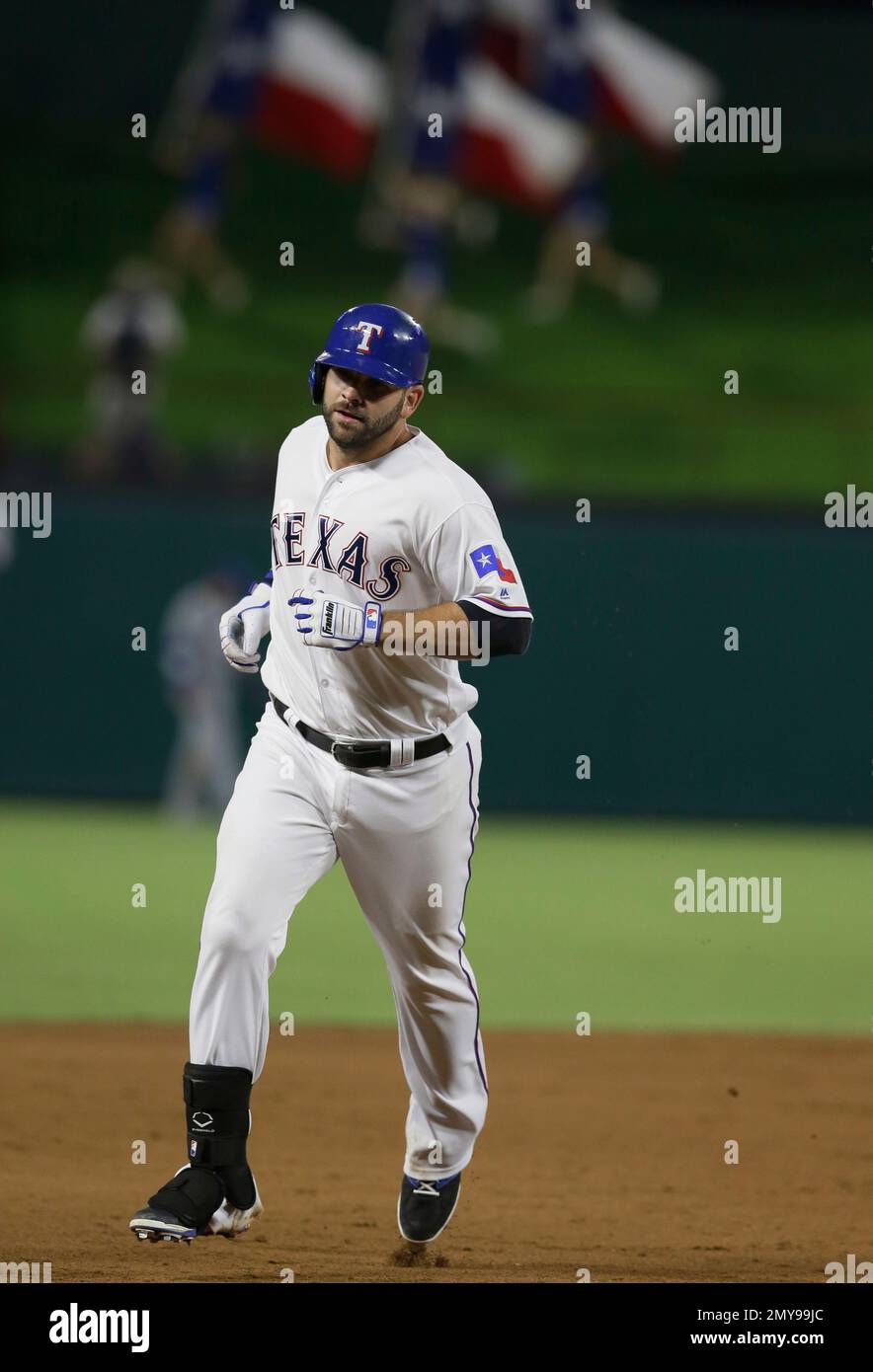 Texas Rangers' Mitch Moreland runs the base after his solo home run ...