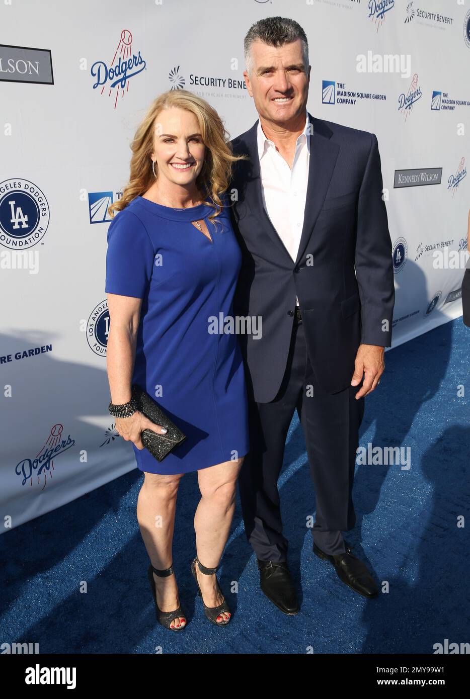 Bob Geren, bench coach for the Los Angeles Dodgers, right, and Pam ...