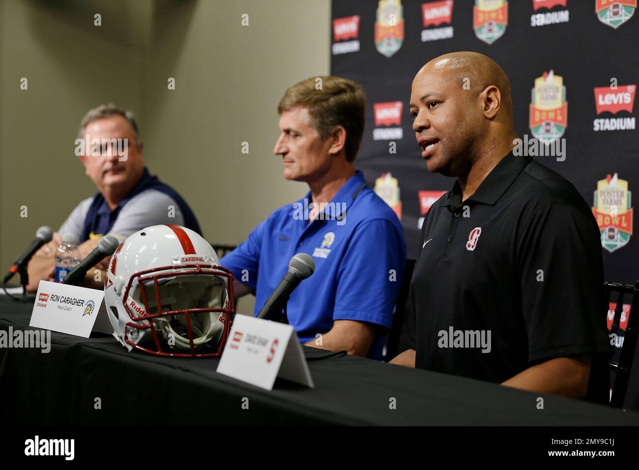 Stanford head coach David Shaw, right, answers questions as San Jose ...