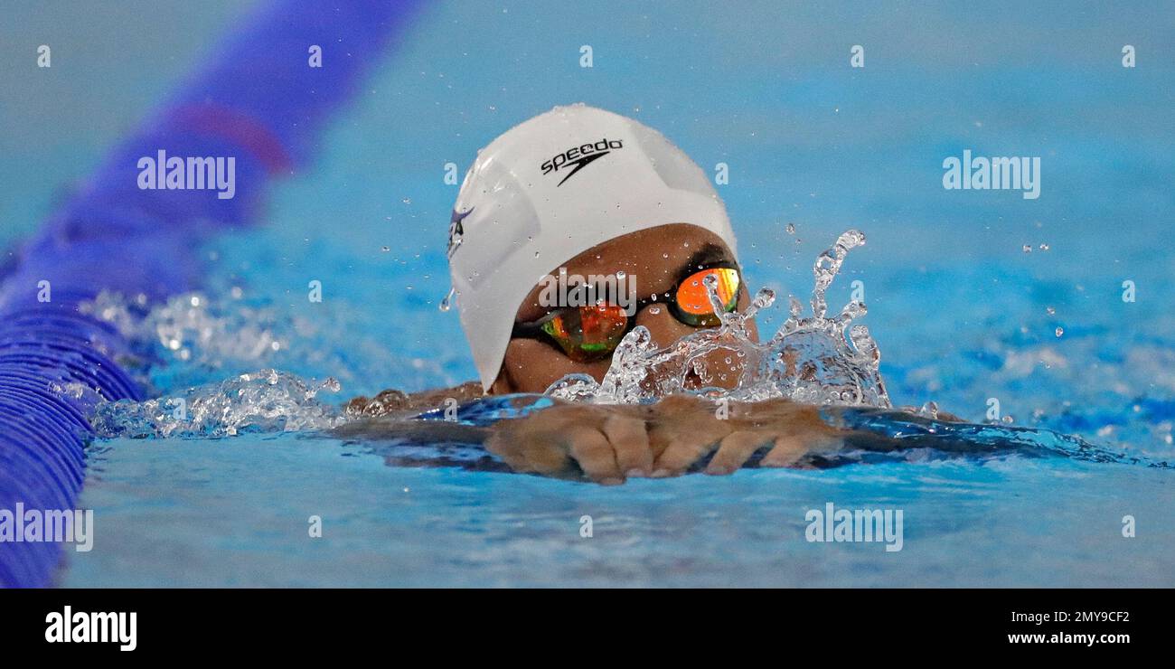 Olympic refugee team member Rami Anis swims practice laps at the ...