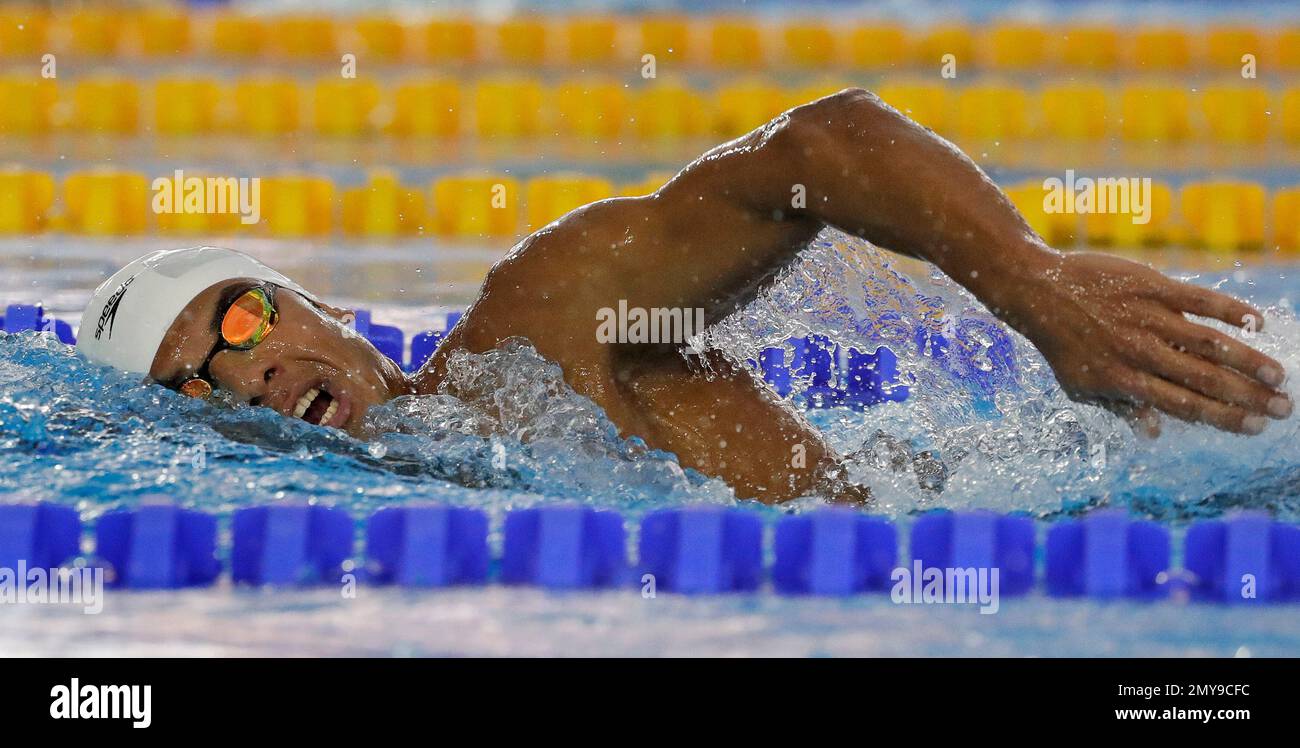 Olympic refugee team member Rami Anis swims practice laps at the ...