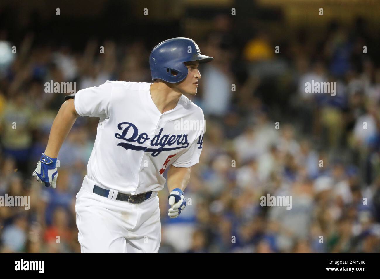 Los Angeles Dodgers' Corey Seager runs to first base after hitting a ...