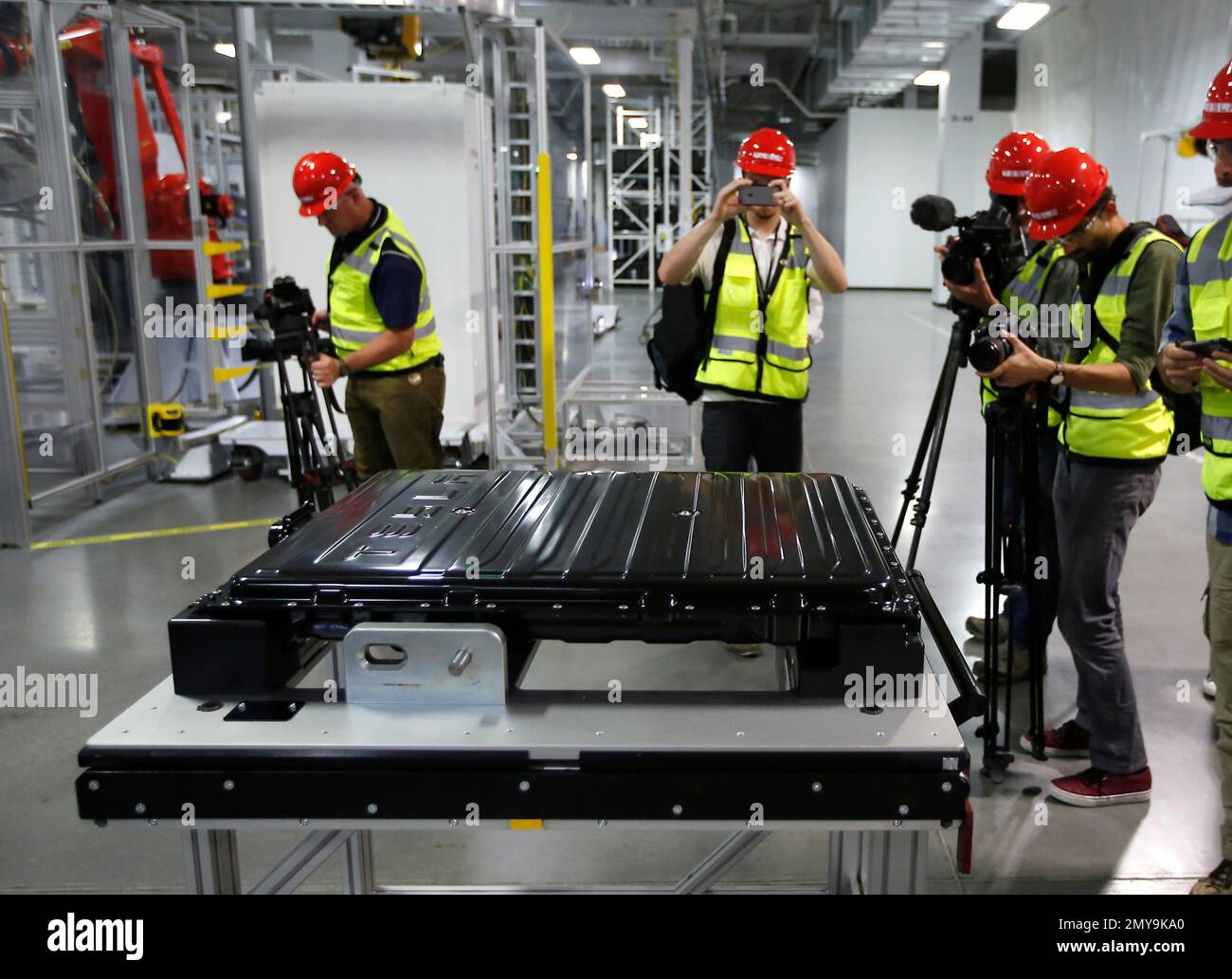 A Tesla battery pack is displayed during a media tour of the new Tesla ...