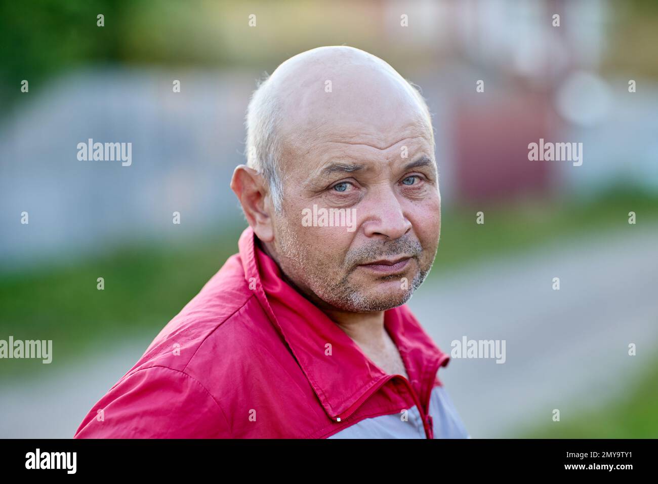 Sad bald European man in his 60s Stock Photo - Alamy