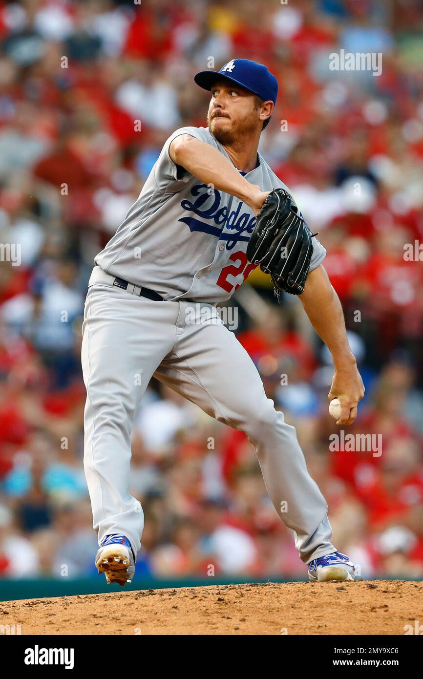 Los Angeles Dodgers starting pitcher Scott Kazmir winds up during the ...