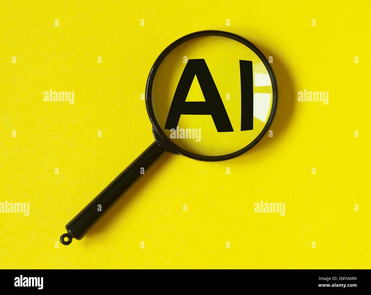 AI artificial intelligence research, study through magnifying glass ...