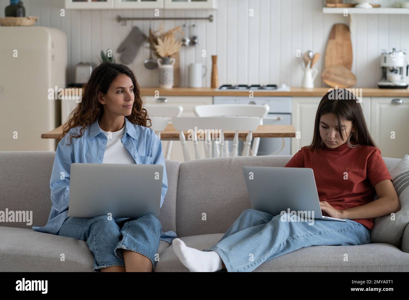 Young woman mother freelancer balancing remote work and parenting Stock ... Young woman mother freelancer balancing remote work and parenting Stock ...