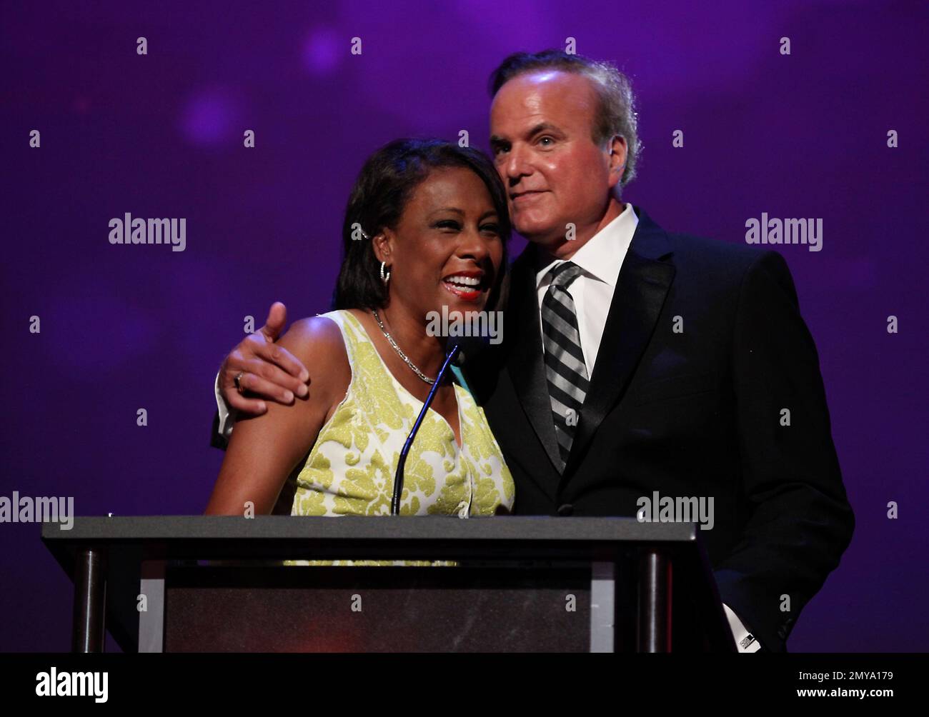 EXCLUSIVE - Pat Harvey, left, and David Goldstein present the Emmy for ...
