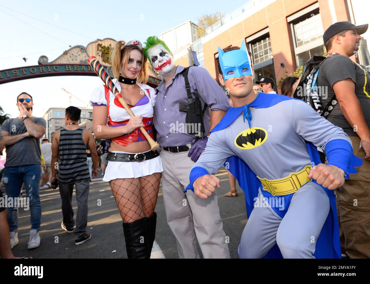 Costumed fans pose for the crowds in the street on day three of the ...