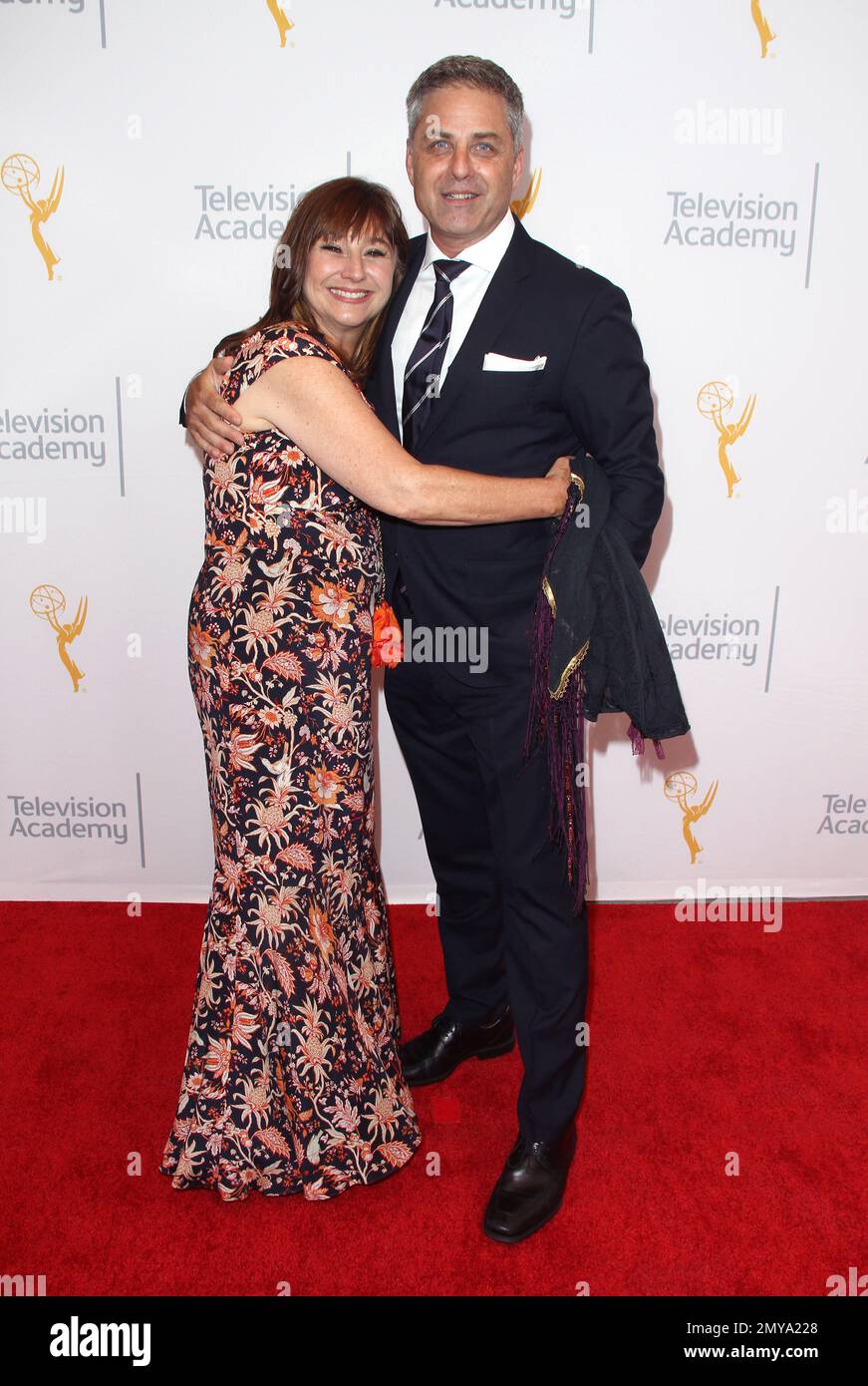 Robbi Morgan, left, and Mark L. Walberg arrive at the L.A. Area Emmy ...