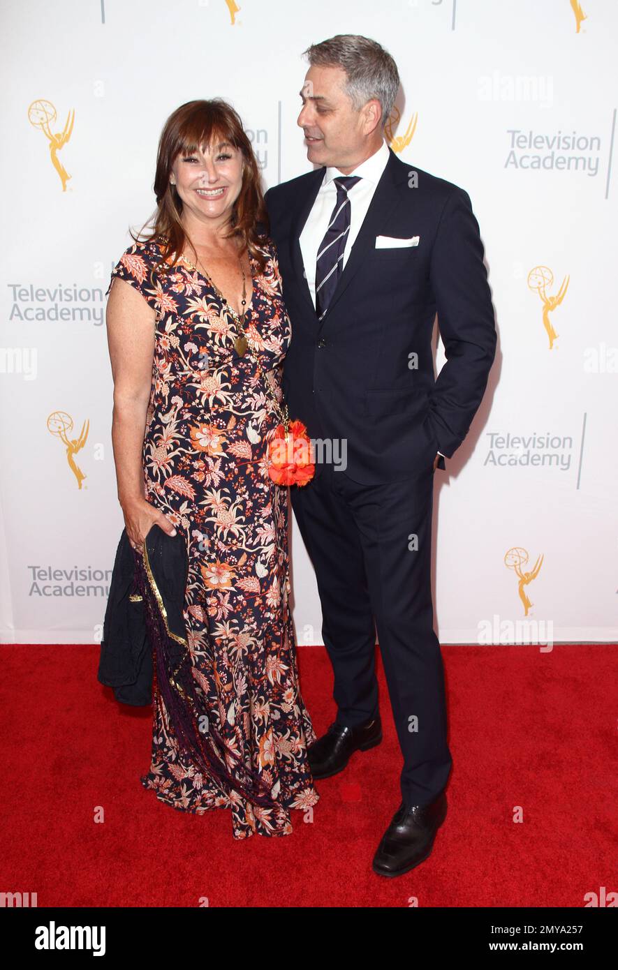 Robbi Morgan, left, and Mark L. Walberg arrive at the L.A. Area Emmy ...