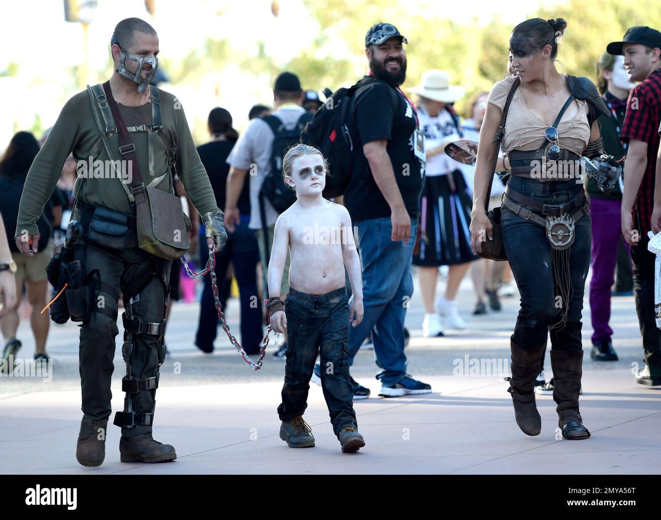 David LeBeau, dressed as Mad Max, from left, Liam LeBeau, dressed as ...