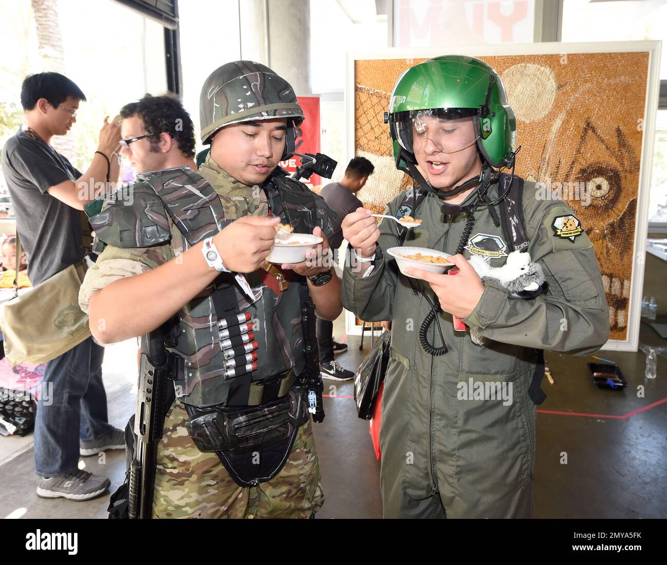 Andrew David, left, and Christian Llamas enjoy a bowl of cereal at ...