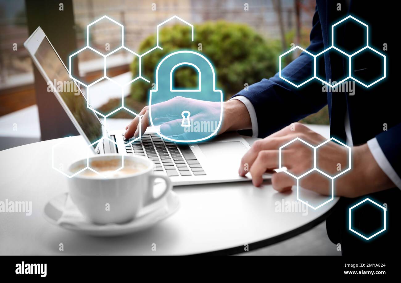 Cyber attack protection. Businessman working with laptop, closeup. Lock ...
