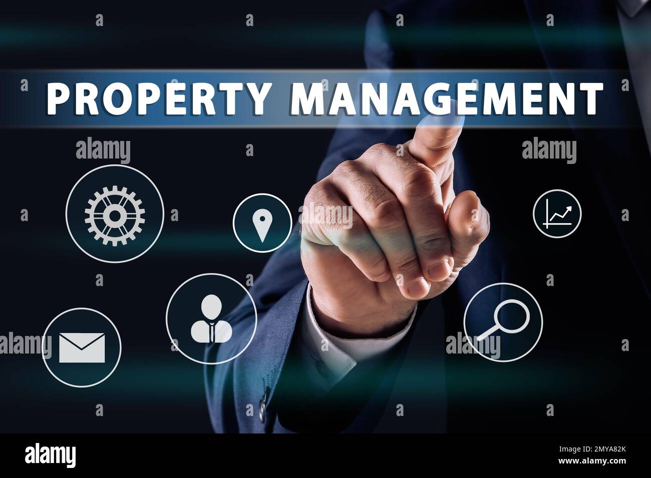 Property management concept. Man using virtual screen with icons ...