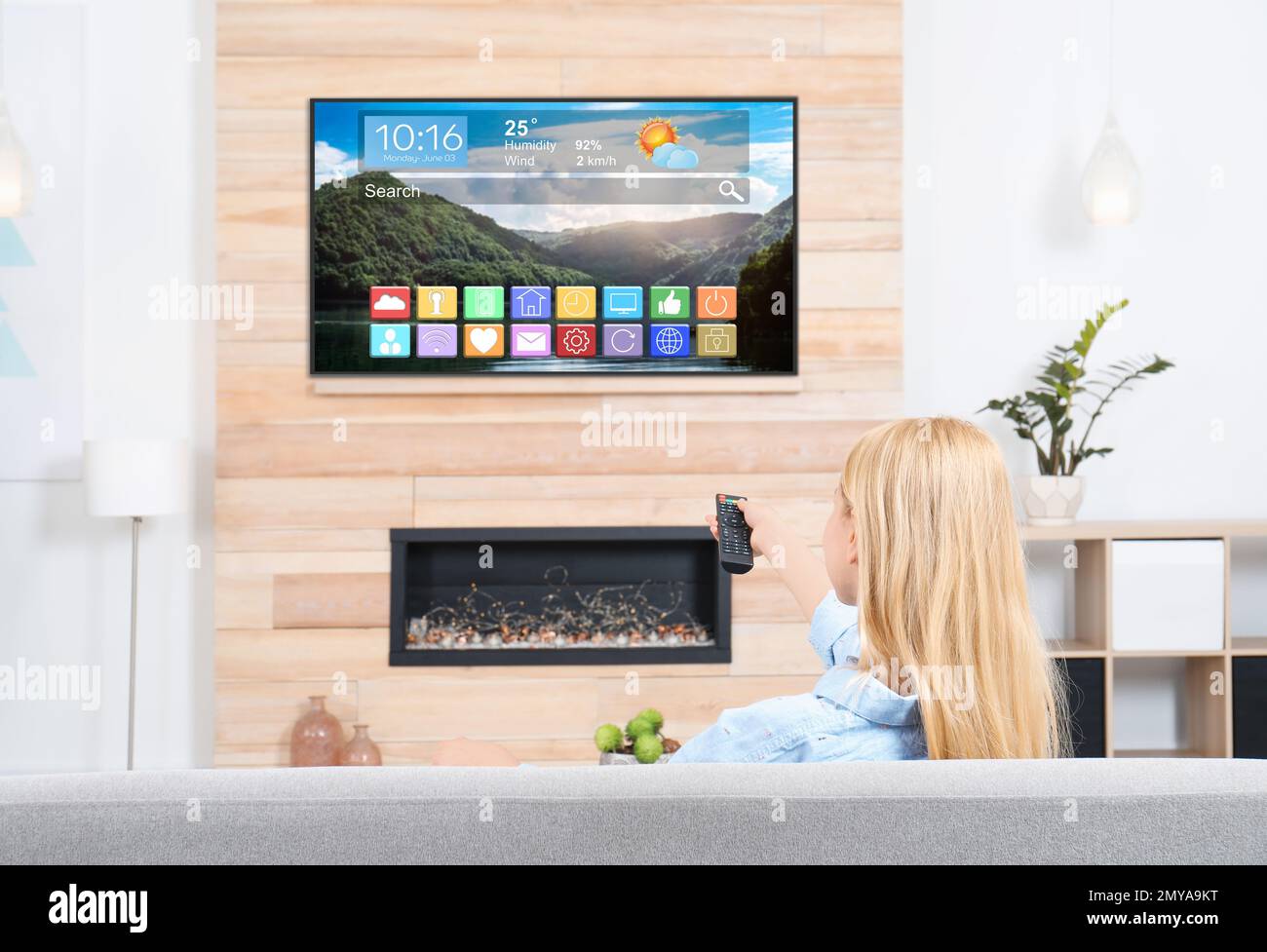 Woman watching smart tv home hi-res stock photography and images - Alamy