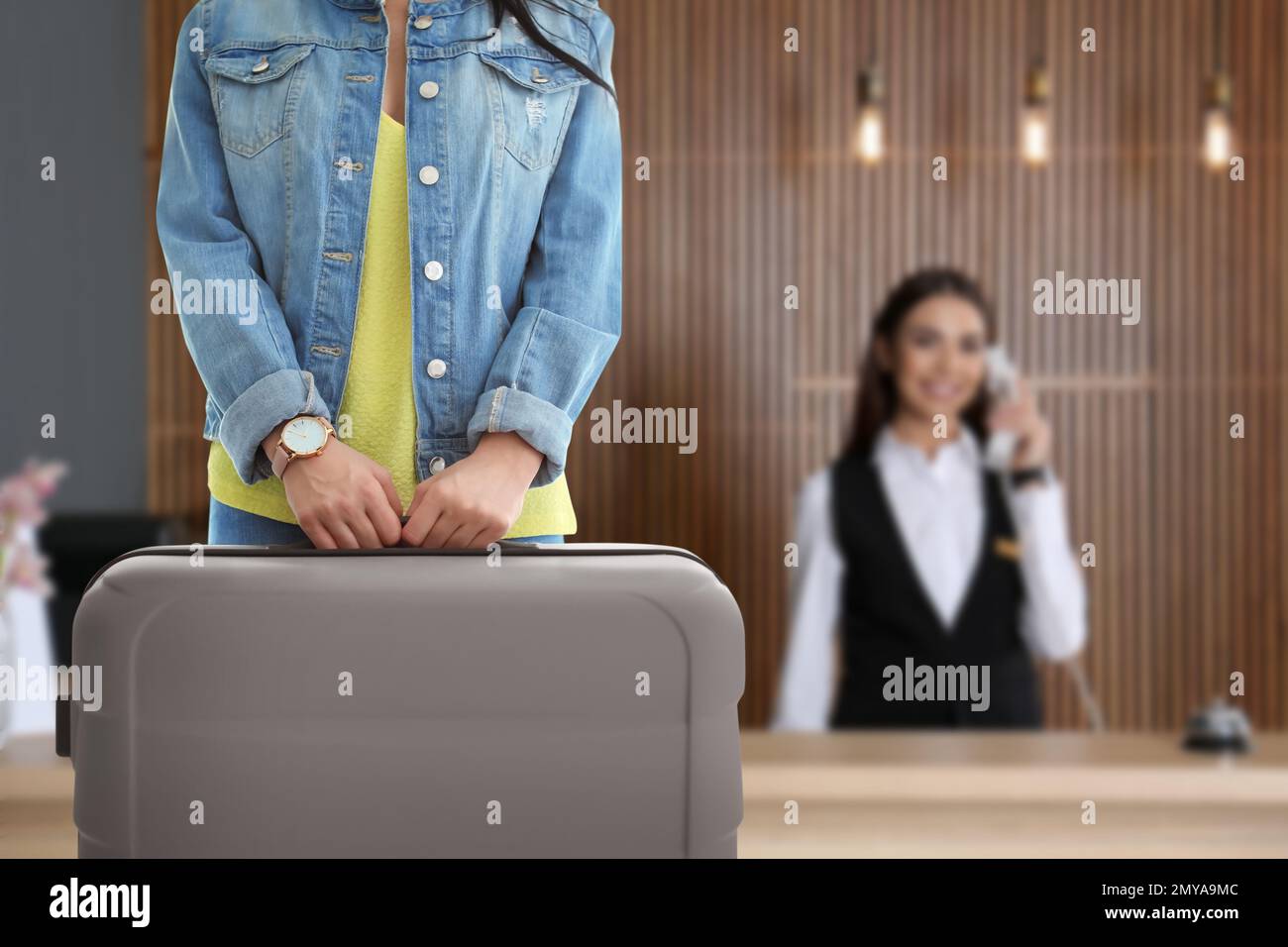 Woman walking office reception lobby hi-res stock photography and ...
